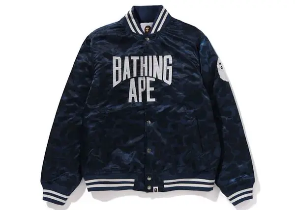 ご*け様 A BATHING APE SOLID CAMO VARSITY JA A Bathing Ape Solid Camo Nyc Logo Nylon Varsity Jacket - Navy Blue